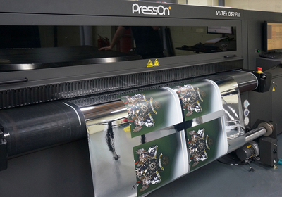 PressOn reduces numbers but ups the output - Digital Printer